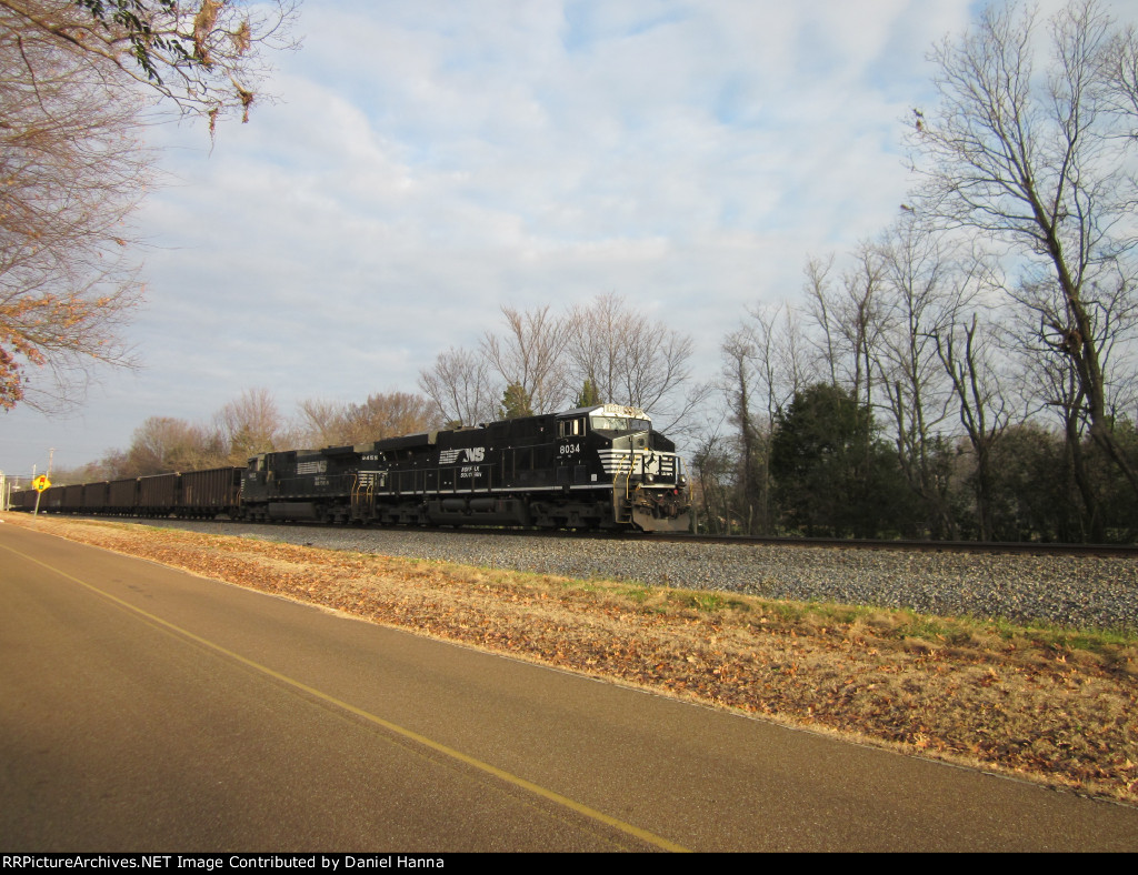 NS 8034 brings up the rear on this empty coal train